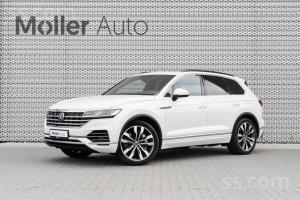 White Volkswagen Touareg 2022 in Riga, with an engine capacity of 3.00 L and mileage of 111 thousand km for 42800 €, photo  on AUTOMOTO.COM.LV