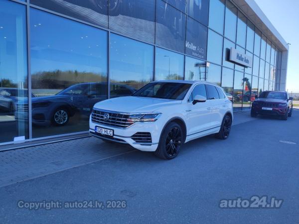 White Volkswagen Touareg 2020 in Tallinn, with an engine capacity of 3.00 L and mileage of 186 thousand km for 34900 €, photo 1 on AUTOMOTO.COM.LV