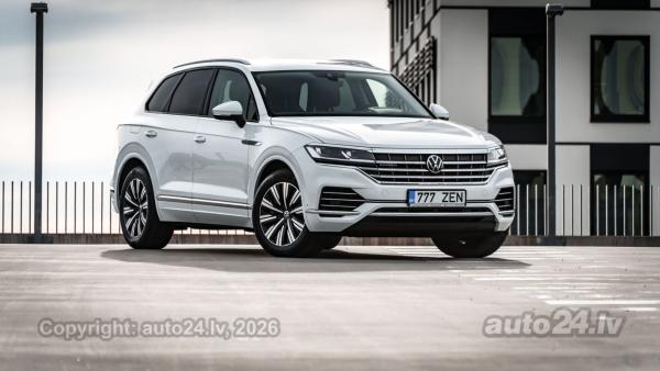 White Volkswagen Touareg 2022 in Tallinn, with an engine capacity of 3.00 L and mileage of 127 thousand km for 51900 €, photo 1 on AUTOMOTO.COM.LV