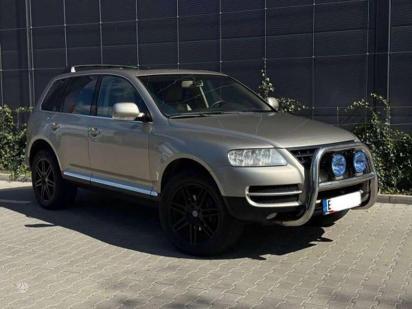 Yellow Volkswagen Touareg 2004 in Klaipeda, with an engine capacity of 3.19 L and mileage of 242 thousand km for 4450 €, photo 4 on AUTOMOTO.COM.LV