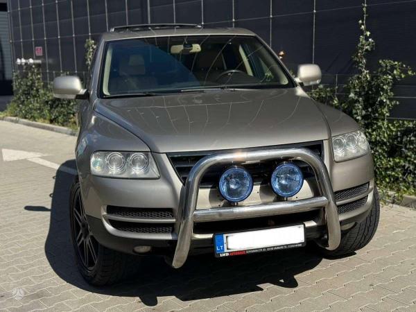 Yellow Volkswagen Touareg 2004 in Klaipeda, with an engine capacity of 3.19 L and mileage of 242 thousand km for 4450 €, photo 6 on AUTOMOTO.COM.LV