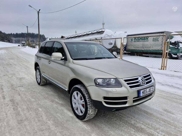 Yellow Volkswagen Touareg 2005 in Vilnius, with an engine capacity of 3.00 L and mileage of 188 thousand km for 5550 €, photo 2 on AUTOMOTO.COM.LV