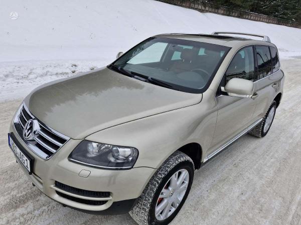 Yellow Volkswagen Touareg 2005 in Vilnius, with an engine capacity of 3.00 L and mileage of 188 thousand km for 5550 €, photo 3 on AUTOMOTO.COM.LV