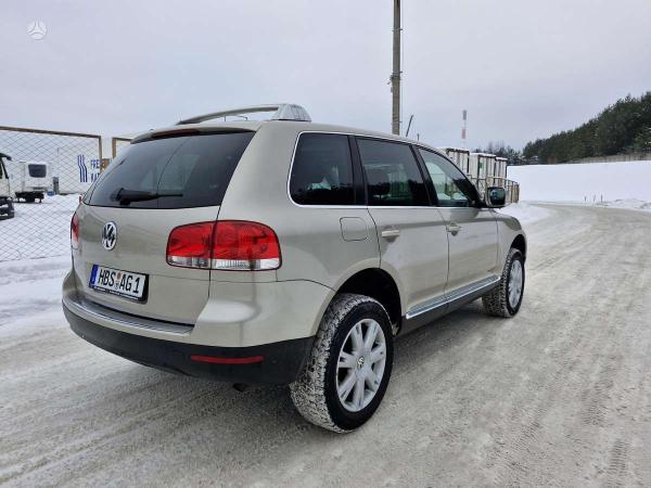 Yellow Volkswagen Touareg 2005 in Vilnius, with an engine capacity of 3.00 L and mileage of 188 thousand km for 5550 €, photo 4 on AUTOMOTO.COM.LV