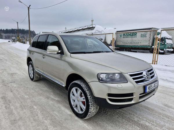 Yellow Volkswagen Touareg 2005 in Vilnius, with an engine capacity of 3.00 L and mileage of 188 thousand km for 5550 €, photo 5 on AUTOMOTO.COM.LV