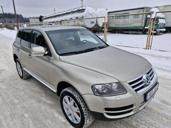 Yellow Volkswagen Touareg 2005 in Vilnius, with an engine capacity of 3.00 L and mileage of 188 thousand km for 5550 €, photo 8 on AUTOMOTO.COM.LV