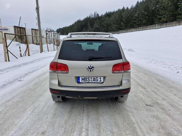 Yellow Volkswagen Touareg 2005 in Vilnius, with an engine capacity of 3.00 L and mileage of 188 thousand km for 5550 €, photo 9 on AUTOMOTO.COM.LV