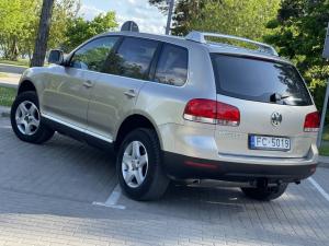 Dzeltens Volkswagen Touareg 2005 Rīga, ar dzinēja tilpumu 2.50 L un nobraukumu 260 tūkst. km par 2850 €, foto 5 vietnē AUTOMOTO.COM.LV