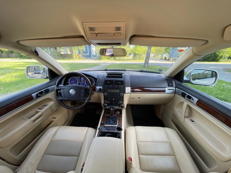 Dzeltens Volkswagen Touareg 2005 Rīga, ar dzinēja tilpumu 2.50 L un nobraukumu 260 tūkst. km par 2850 €, foto 19 vietnē AUTOMOTO.COM.LV