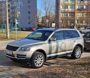 Yellow Volkswagen Touareg 2006 in Riga, with an engine capacity of 2.50 L and mileage of 376 thousand km for 1500 €, photo  on AUTOMOTO.COM.LV