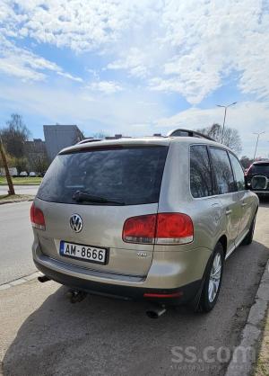 Yellow Volkswagen Touareg 2006 in Riga, with an engine capacity of 2.50 L and mileage of 376 thousand km for 1500 €, photo 3 on AUTOMOTO.COM.LV