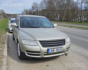 Yellow Volkswagen Touareg 2006 in Riga, with an engine capacity of 2.50 L and mileage of 376 thousand km for 1500 €, photo 4 on AUTOMOTO.COM.LV