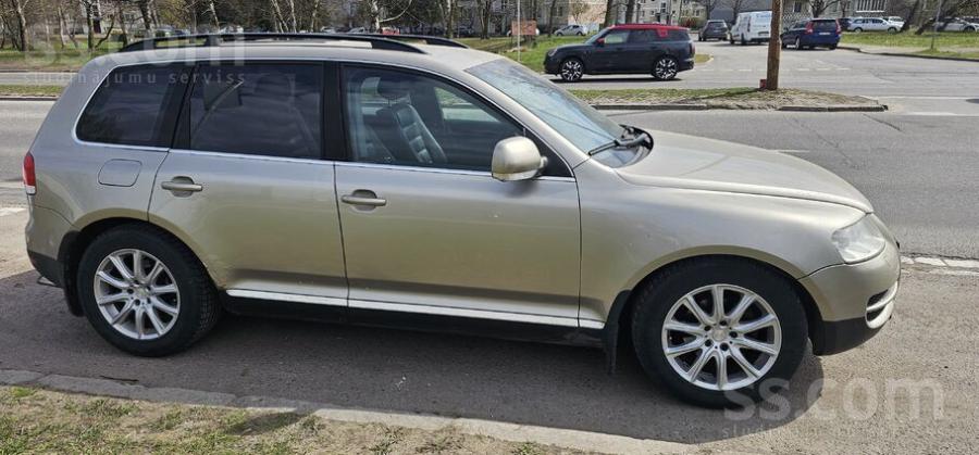 Yellow Volkswagen Touareg 2006 in Riga, with an engine capacity of 2.50 L and mileage of 376 thousand km for 1500 €, photo 10 on AUTOMOTO.COM.LV