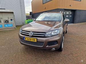 Dzeltens Volkswagen Touareg 2011 Raseiniai, ar dzinēja tilpumu 4.13 L un nobraukumu 220 tūkst. km par 12850 €, foto 3 vietnē AUTOMOTO.COM.LV