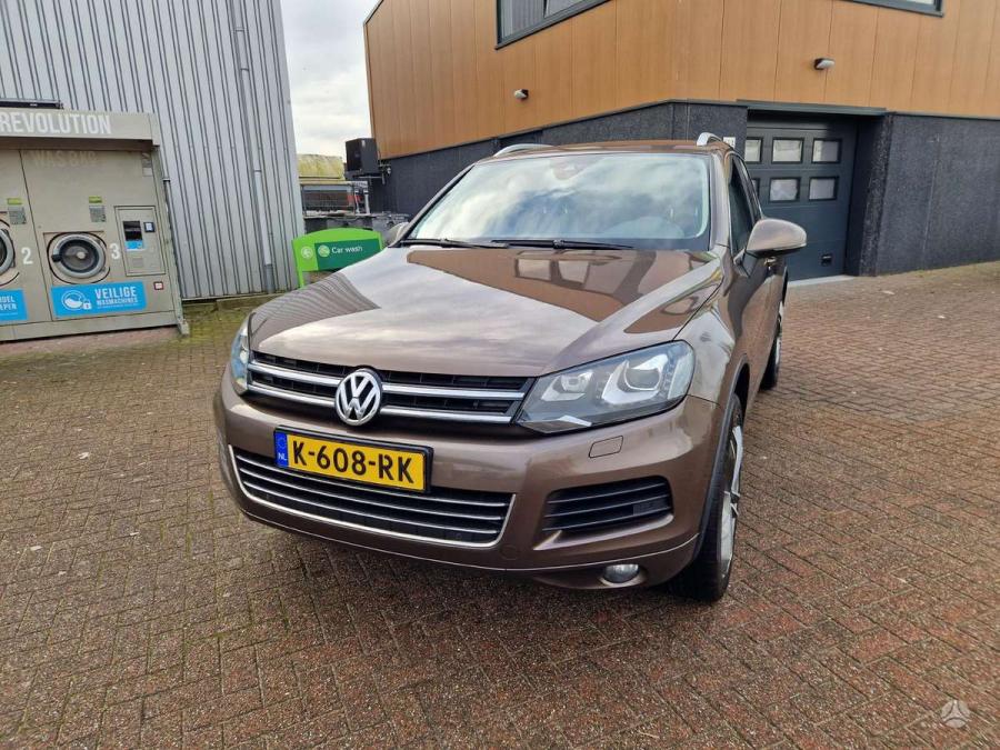 Dzeltens Volkswagen Touareg 2011 Raseiniai, ar dzinēja tilpumu 4.13 L un nobraukumu 220 tūkst. km par 12850 €, foto 3 vietnē AUTOMOTO.COM.LV