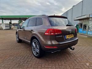 Dzeltens Volkswagen Touareg 2011 Raseiniai, ar dzinēja tilpumu 4.13 L un nobraukumu 220 tūkst. km par 12850 €, foto 5 vietnē AUTOMOTO.COM.LV