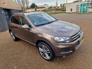 Dzeltens Volkswagen Touareg 2011 Raseiniai, ar dzinēja tilpumu 4.13 L un nobraukumu 220 tūkst. km par 12850 €, foto 9 vietnē AUTOMOTO.COM.LV