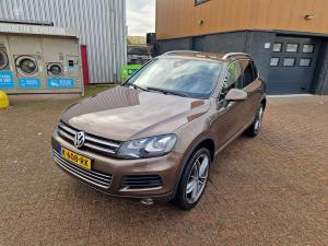 Dzeltens Volkswagen Touareg 2011 Raseiniai, ar dzinēja tilpumu 4.13 L un nobraukumu 220 tūkst. km par 12850 €, foto 10 vietnē AUTOMOTO.COM.LV