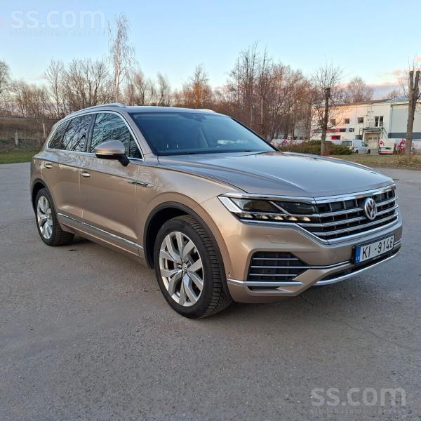 Dzeltens Volkswagen Touareg 2018 Rīga, ar dzinēja tilpumu 3.00 L un nobraukumu 212 tūkst. km par 27500 €, foto 1 vietnē AUTOMOTO.COM.LV