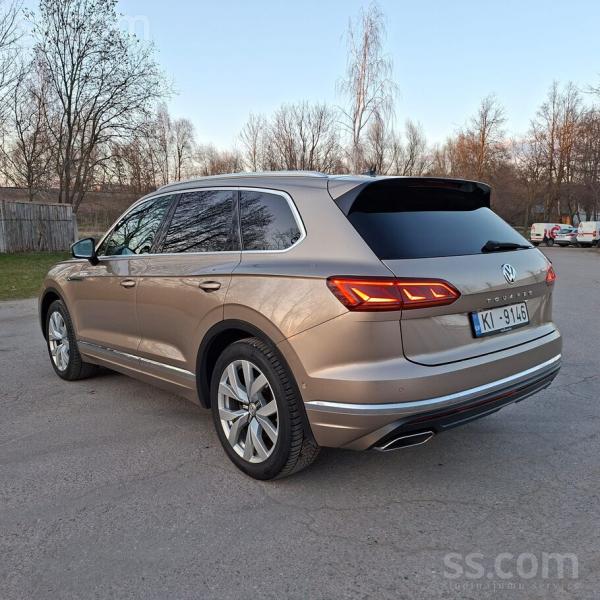 Dzeltens Volkswagen Touareg 2018 Rīga, ar dzinēja tilpumu 3.00 L un nobraukumu 212 tūkst. km par 27500 €, foto 7 vietnē AUTOMOTO.COM.LV