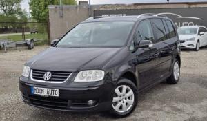 Melns Volkswagen Touran 2004 Rīga, ar dzinēja tilpumu 2.00 L un nobraukumu 244 tūkst. km par 3200 €, foto 14 vietnē AUTOMOTO.COM.LV