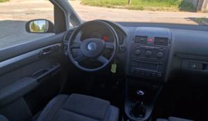 Melns Volkswagen Touran 2004 Rīga, ar dzinēja tilpumu 2.00 L un nobraukumu 244 tūkst. km par 3200 €, foto 17 vietnē AUTOMOTO.COM.LV