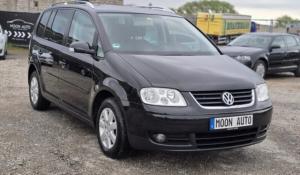 Melns Volkswagen Touran 2004 Rīga, ar dzinēja tilpumu 2.00 L un nobraukumu 244 tūkst. km par 3200 €, foto 23 vietnē AUTOMOTO.COM.LV