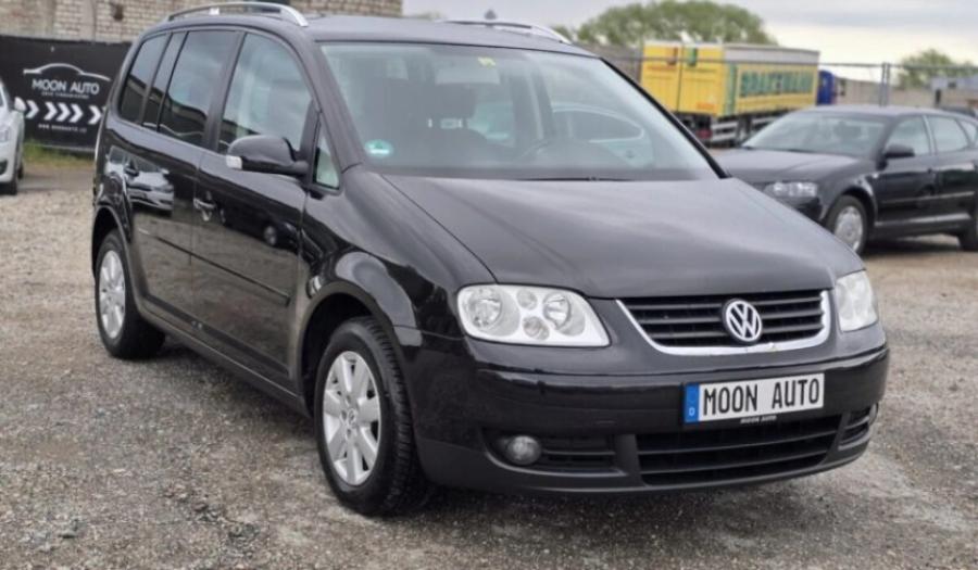 Melns Volkswagen Touran 2004 Rīga, ar dzinēja tilpumu 2.00 L un nobraukumu 244 tūkst. km par 3200 €, foto 23 vietnē AUTOMOTO.COM.LV