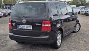 Melns Volkswagen Touran 2004 Rīga, ar dzinēja tilpumu 2.00 L un nobraukumu 244 tūkst. km par 3200 €, foto 25 vietnē AUTOMOTO.COM.LV