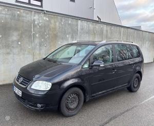 Black Volkswagen Touran 2006 in Vilnius, with an engine capacity of 1.97 L and mileage of 300 thousand km for 1750 €, photo 3 on AUTOMOTO.COM.LV