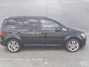Melns Volkswagen Touran 2011 Jurbarkas, ar dzinēja tilpumu 2.00 L un nobraukumu 267 tūkst. km par 5300 €, foto 6 vietnē AUTOMOTO.COM.LV