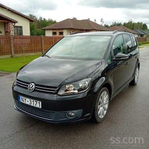Black Volkswagen Touran 2013 in Riga, with an engine capacity of 1.60 L and mileage of 280 thousand km for 6550 €, photo 11 on AUTOMOTO.COM.LV