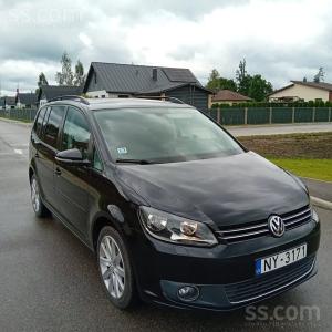 Black Volkswagen Touran 2013 in Riga, with an engine capacity of 1.60 L and mileage of 280 thousand km for 6550 €, photo 12 on AUTOMOTO.COM.LV
