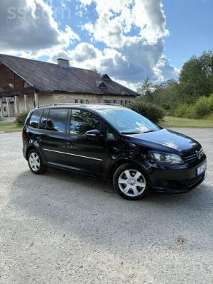 Melns Volkswagen Touran 2011 Madona, ar dzinēja tilpumu 2.00 L un nobraukumu 462 tūkst. km par 3500 €, foto 3 vietnē AUTOMOTO.COM.LV