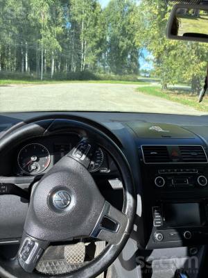 Melns Volkswagen Touran 2011 Madona, ar dzinēja tilpumu 2.00 L un nobraukumu 462 tūkst. km par 3500 €, foto 9 vietnē AUTOMOTO.COM.LV