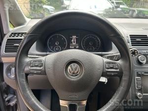 Black Volkswagen Touran 2011 in Riga, with an engine capacity of 2.00 L and mileage of 253 thousand km for 5500 €, photo 8 on AUTOMOTO.COM.LV