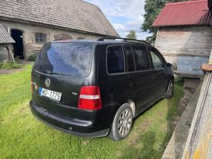 Black Volkswagen Touran 2003 in Riga, with an engine capacity of 1.90 L and mileage of 336 thousand km for 1400 €, photo  on AUTOMOTO.COM.LV