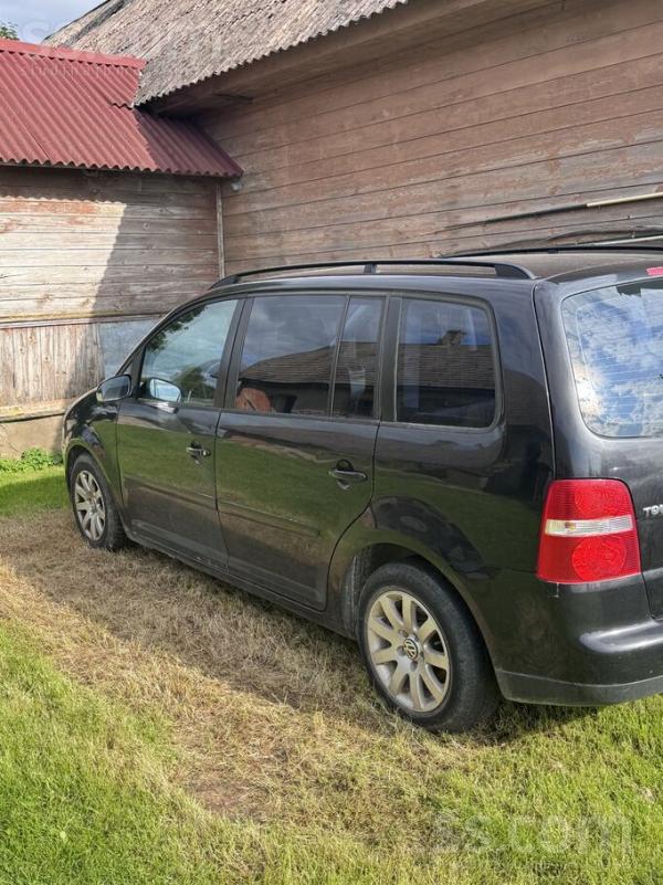Melns Volkswagen Touran 2003 Rīga, ar dzinēja tilpumu 1.90 L un nobraukumu 336 tūkst. km par 1400 €, foto 6 vietnē AUTOMOTO.COM.LV