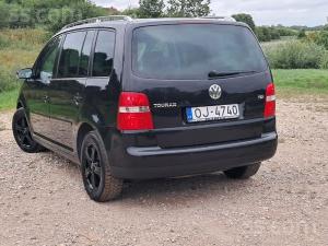 Melns Volkswagen Touran 2003 Saldus, ar dzinēja tilpumu 1.90 L un nobraukumu 248 tūkst. km par 2950 €, foto 11 vietnē AUTOMOTO.COM.LV