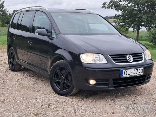 Melns Volkswagen Touran 2003 Saldus, ar dzinēja tilpumu 1.90 L un nobraukumu 248 tūkst. km par 2950 €, foto 1 vietnē AUTOMOTO.COM.LV
