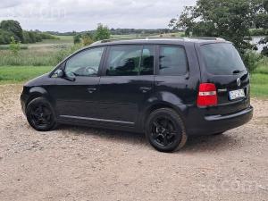 Melns Volkswagen Touran 2003 Saldus, ar dzinēja tilpumu 1.90 L un nobraukumu 248 tūkst. km par 2950 €, foto 29 vietnē AUTOMOTO.COM.LV