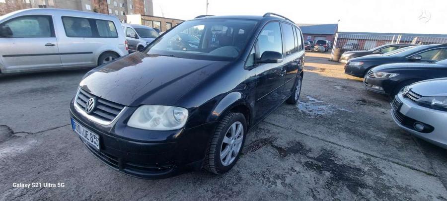 Melns Volkswagen Touran 2004 Kėdainiai, ar dzinēja tilpumu 1.90 L un nobraukumu 349 tūkst. km par 799 €, foto 4 vietnē AUTOMOTO.COM.LV