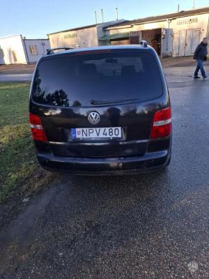 Black Volkswagen Touran 2004 in Panevezys, with an engine capacity of 1.90 L and mileage of 330 thousand km for 1250 €, photo 4 on AUTOMOTO.COM.LV