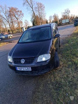 Black Volkswagen Touran 2004 in Panevezys, with an engine capacity of 1.90 L and mileage of 330 thousand km for 1250 €, photo 7 on AUTOMOTO.COM.LV