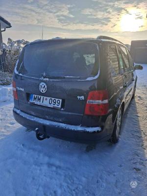 Melns Volkswagen Touran 2004 Panevēža, ar dzinēja tilpumu 1.97 L un nobraukumu 302 tūkst. km par 1750 €, foto 6 vietnē AUTOMOTO.COM.LV