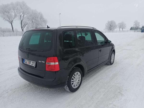 Black Volkswagen Touran 2004 in Marijampole, with an engine capacity of 1.97 L and mileage of 315 thousand km for 2150 €, photo 8 on AUTOMOTO.COM.LV
