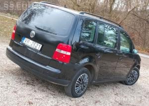 Black Volkswagen Touran 2004 in Tukums, with an engine capacity of 1.90 L and mileage of 0 thousand km for 1250 €, photo 4 on AUTOMOTO.COM.LV