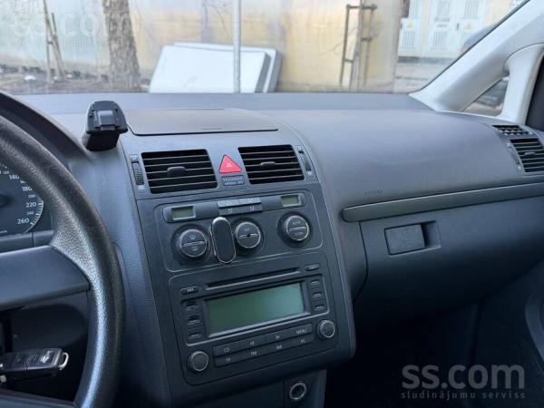 Black Volkswagen Touran 2004 in Riga, with an engine capacity of 2.00 L and mileage of 400 thousand km for 1490 €, photo 6 on AUTOMOTO.COM.LV