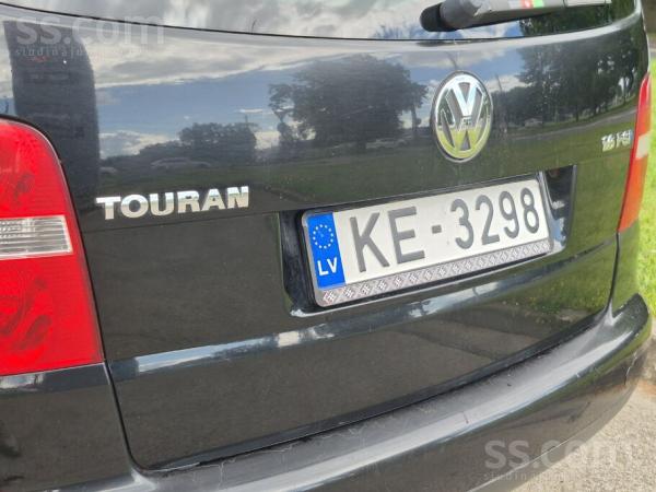 Melns Volkswagen Touran 2004 Rīga, ar dzinēja tilpumu 1.60 L un nobraukumu 290 tūkst. km par 2200 €, foto 6 vietnē AUTOMOTO.COM.LV