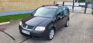 Black Volkswagen Touran 2004 in Tukums, with an engine capacity of 1.90 L and mileage of 279 thousand km for 1590 €, photo  on AUTOMOTO.COM.LV